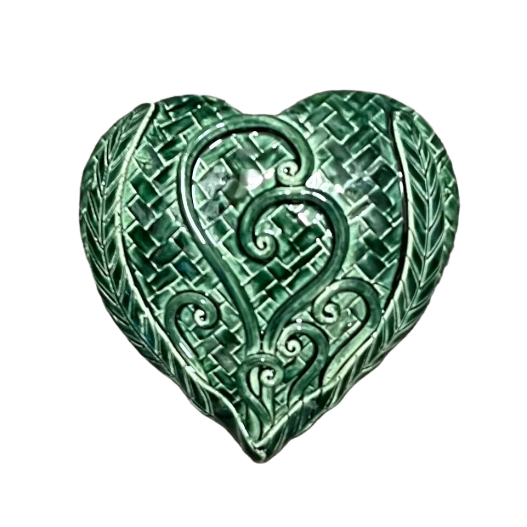 Beautiful green medium ceramic Koru Heart handmade by Robyn Kunin.
