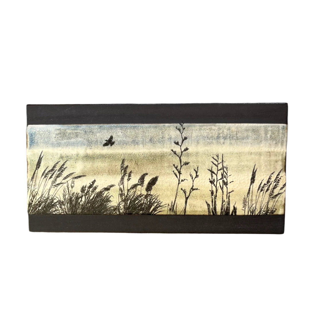 Tui Soaring Above Toe Toe Grass Black Clay Wall Tile by Frankie Harker