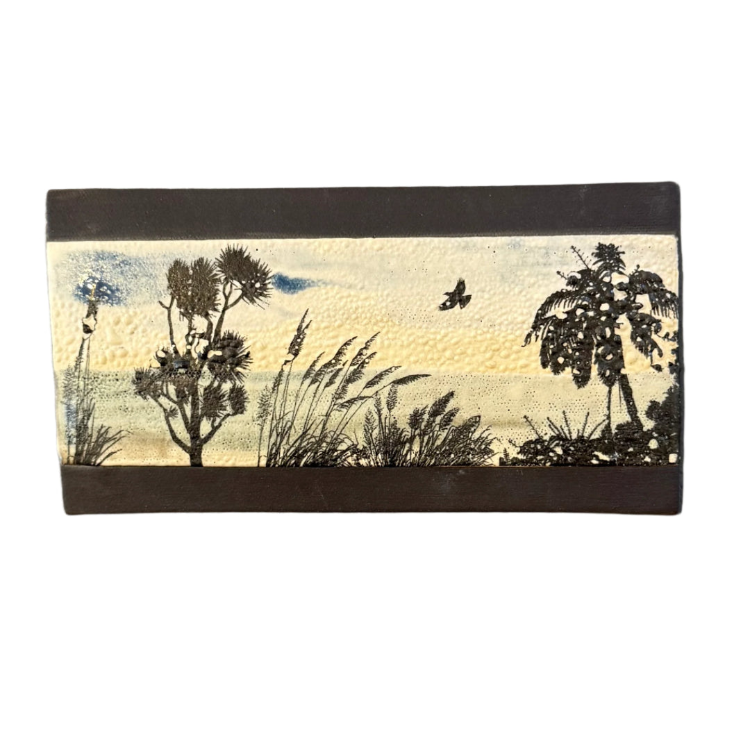 Tui Above Native Bush Large Black Clay Wall Tile by Frankie Harker