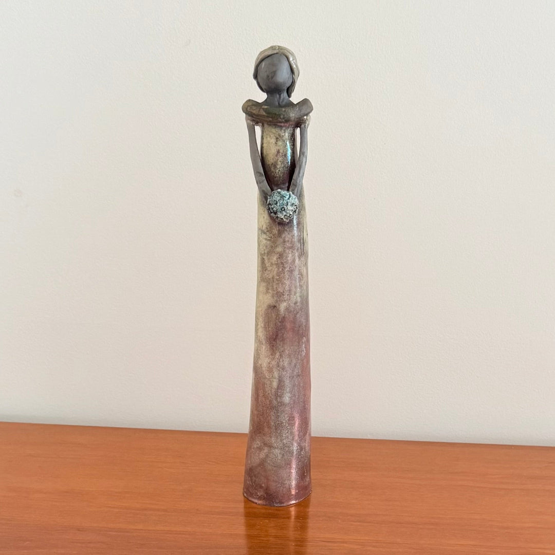 Lady In Black Clay With Blue Posy By Jenny Matthews